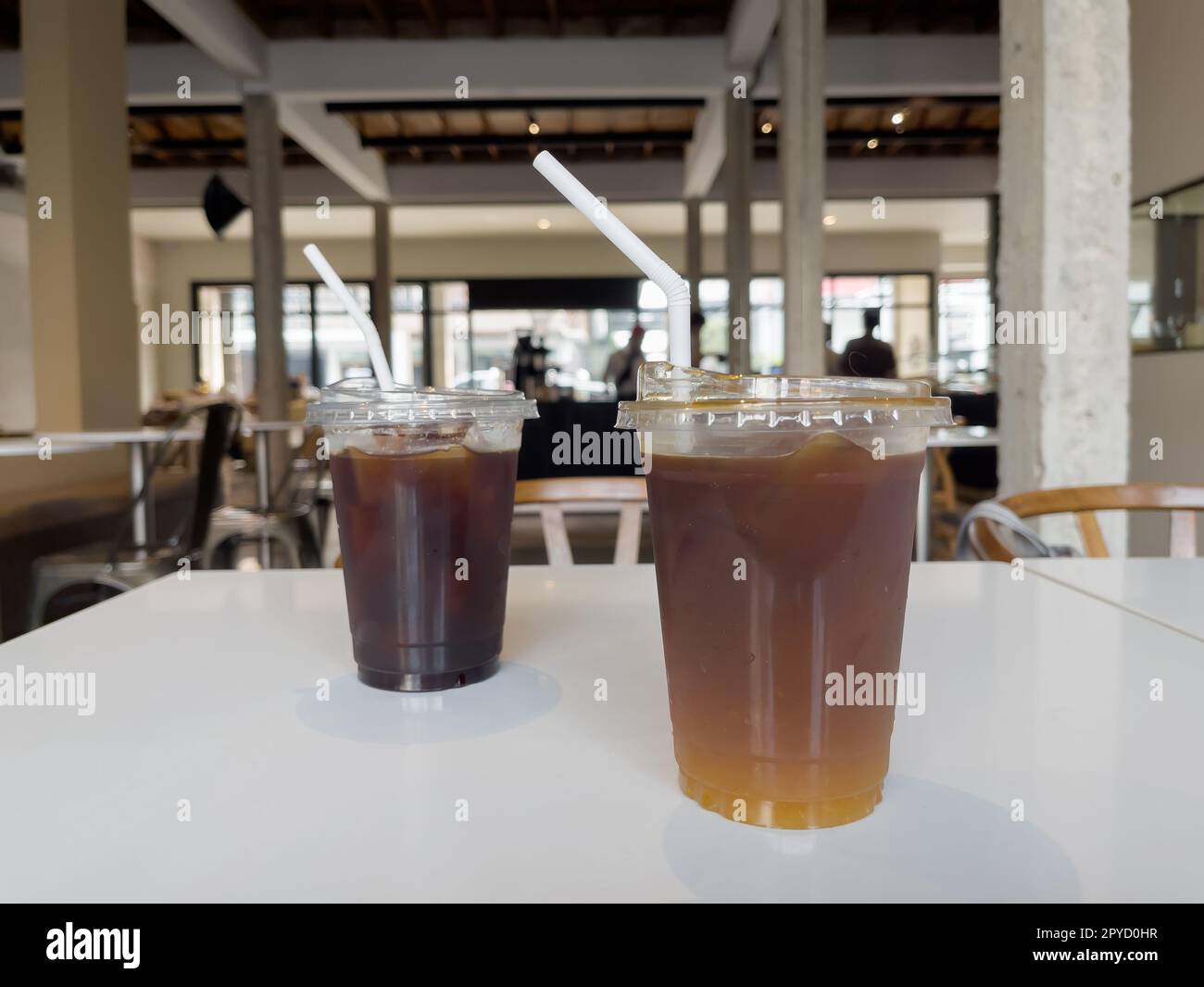 Iced americano with orange and iced americano in coffee shop Stock ...