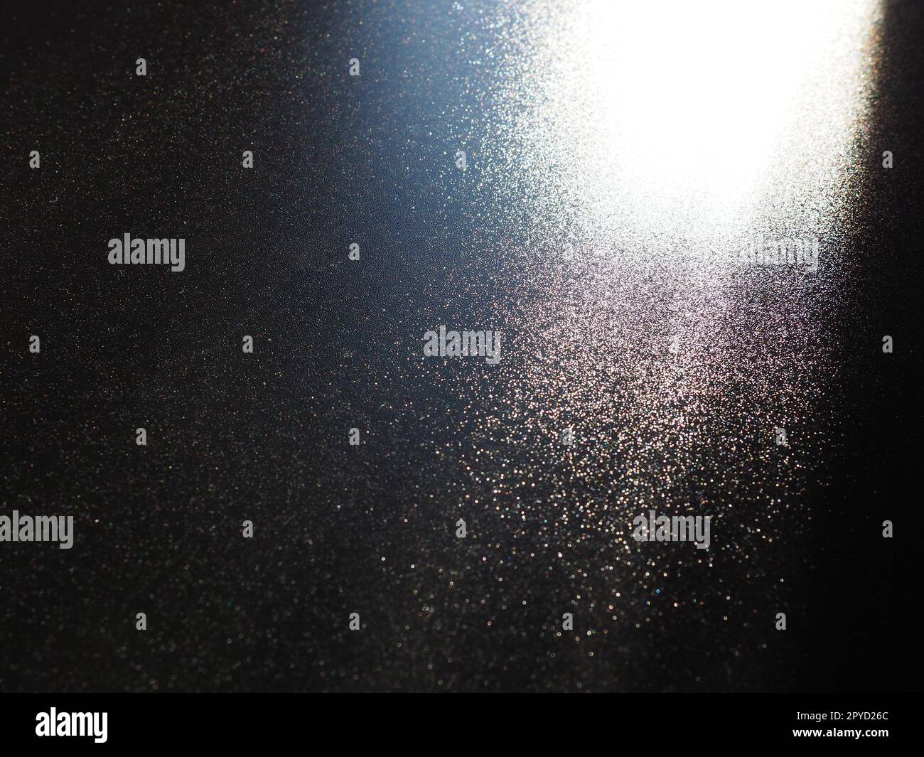 Abstract black background. Oblique light rays on a black blackdrop with ...