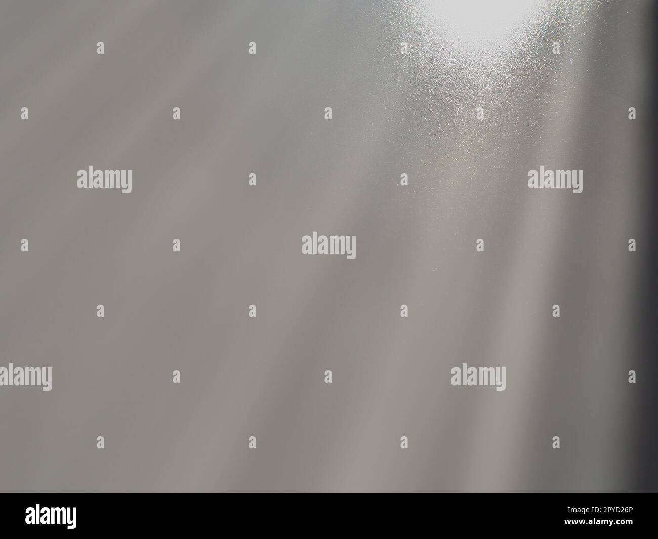 Diagonal rays of light on a gray background. Blurred abstract ...
