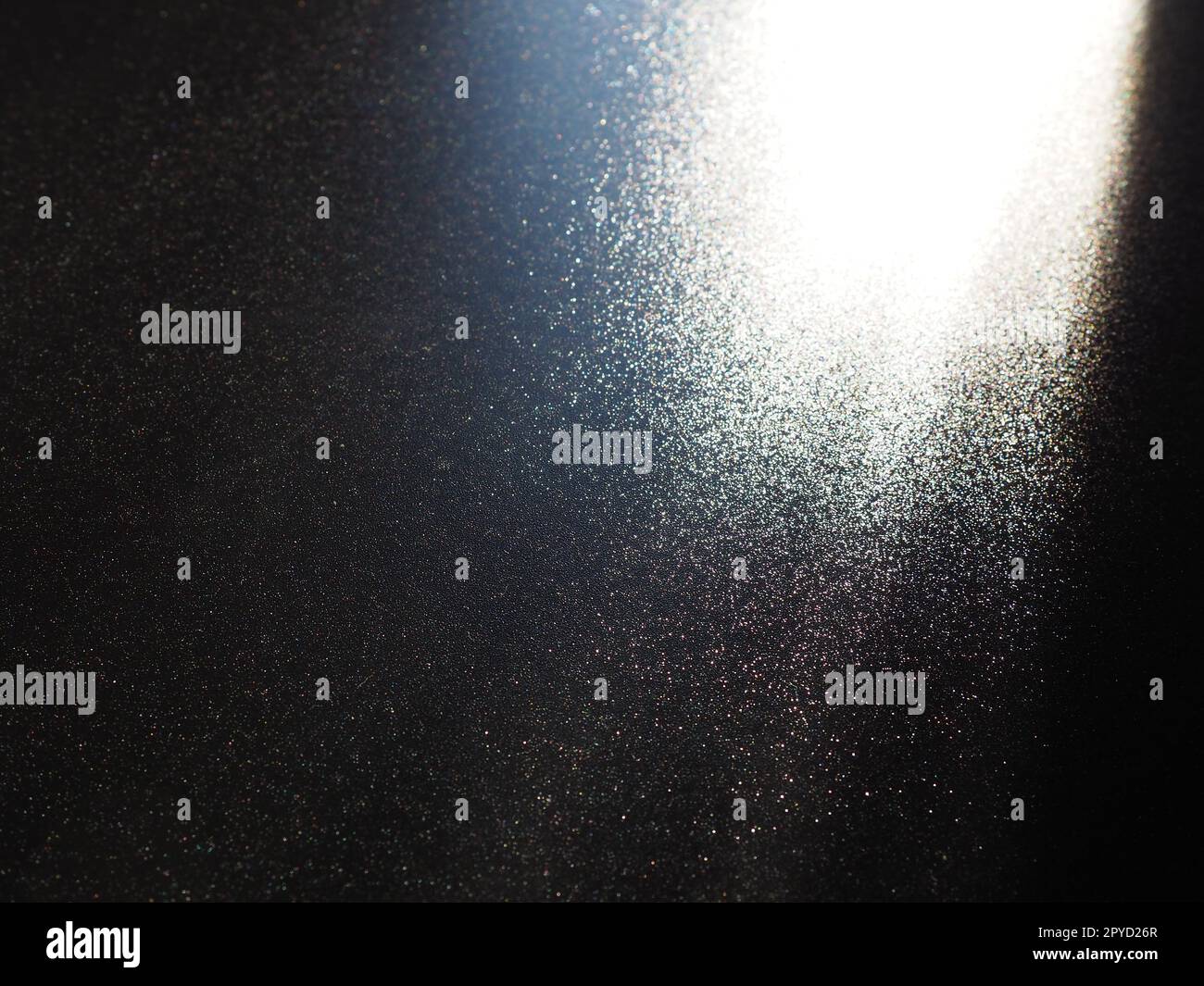 Abstract black background. Oblique light rays on a black blackdrop with ...