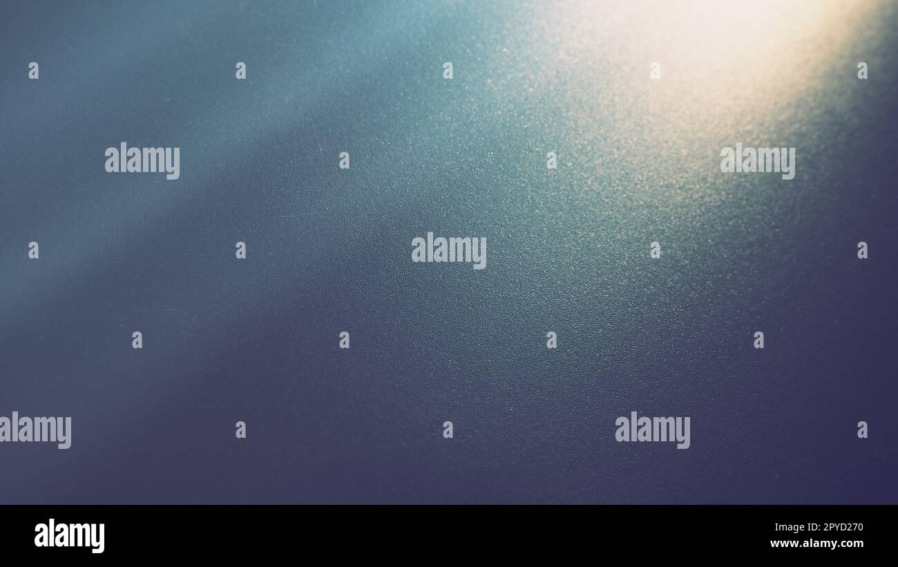 Oblique rays of light on a blue background. Blurred abstract backdrop ...