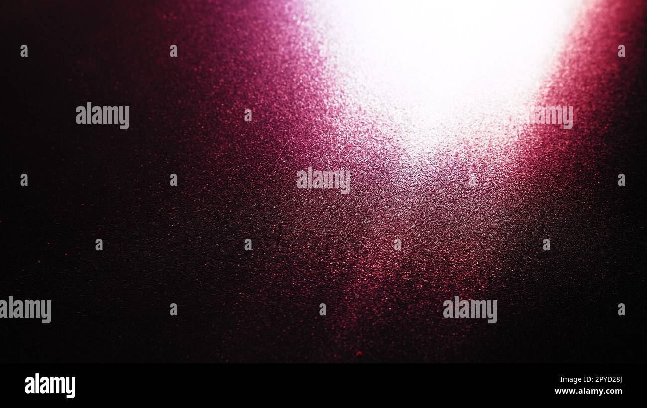 Diagonal rays of light on a red, burgundy and black background. Blurred ...