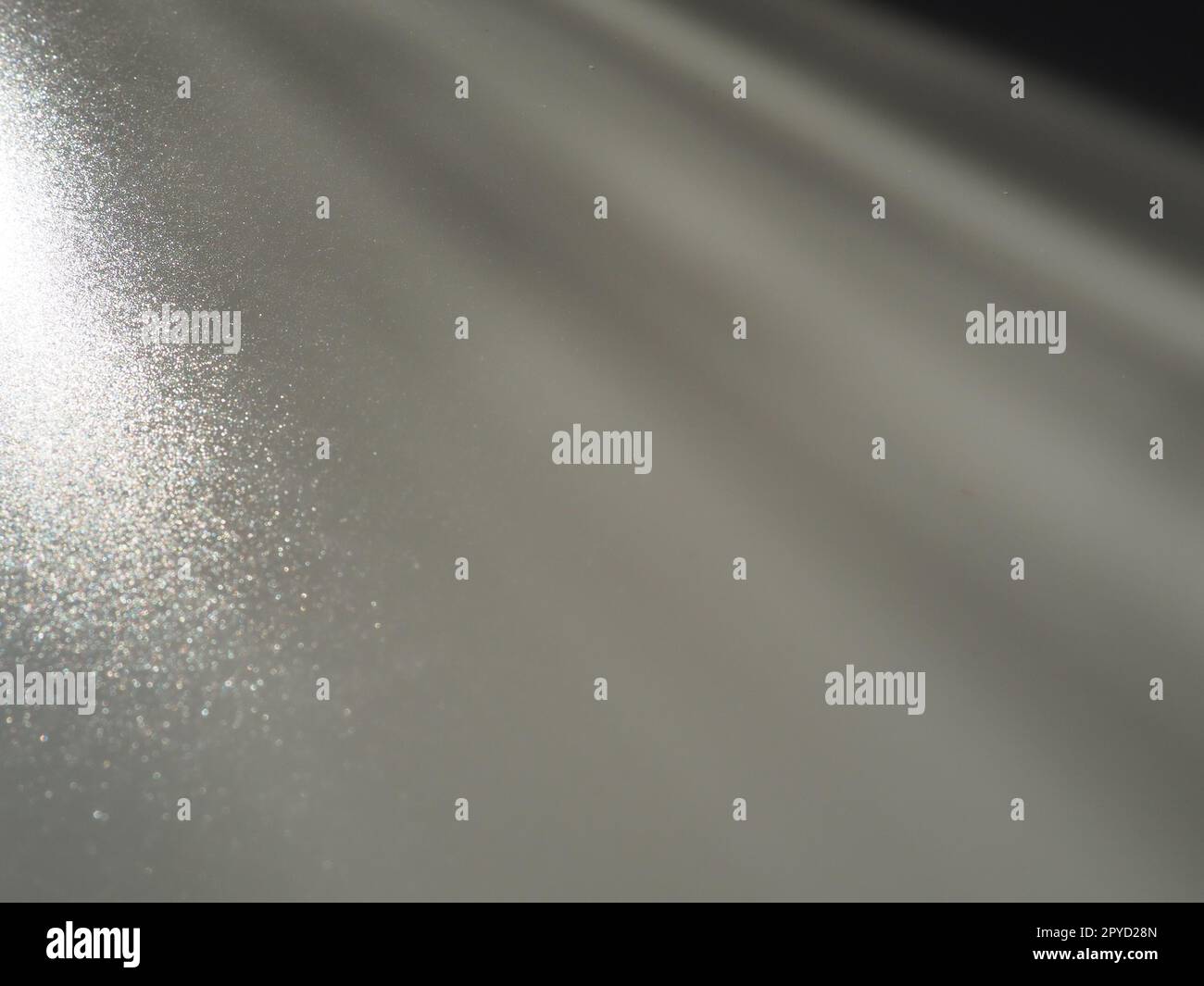 Diagonal Rays Of Light On A Gray Background Blurred Abstract