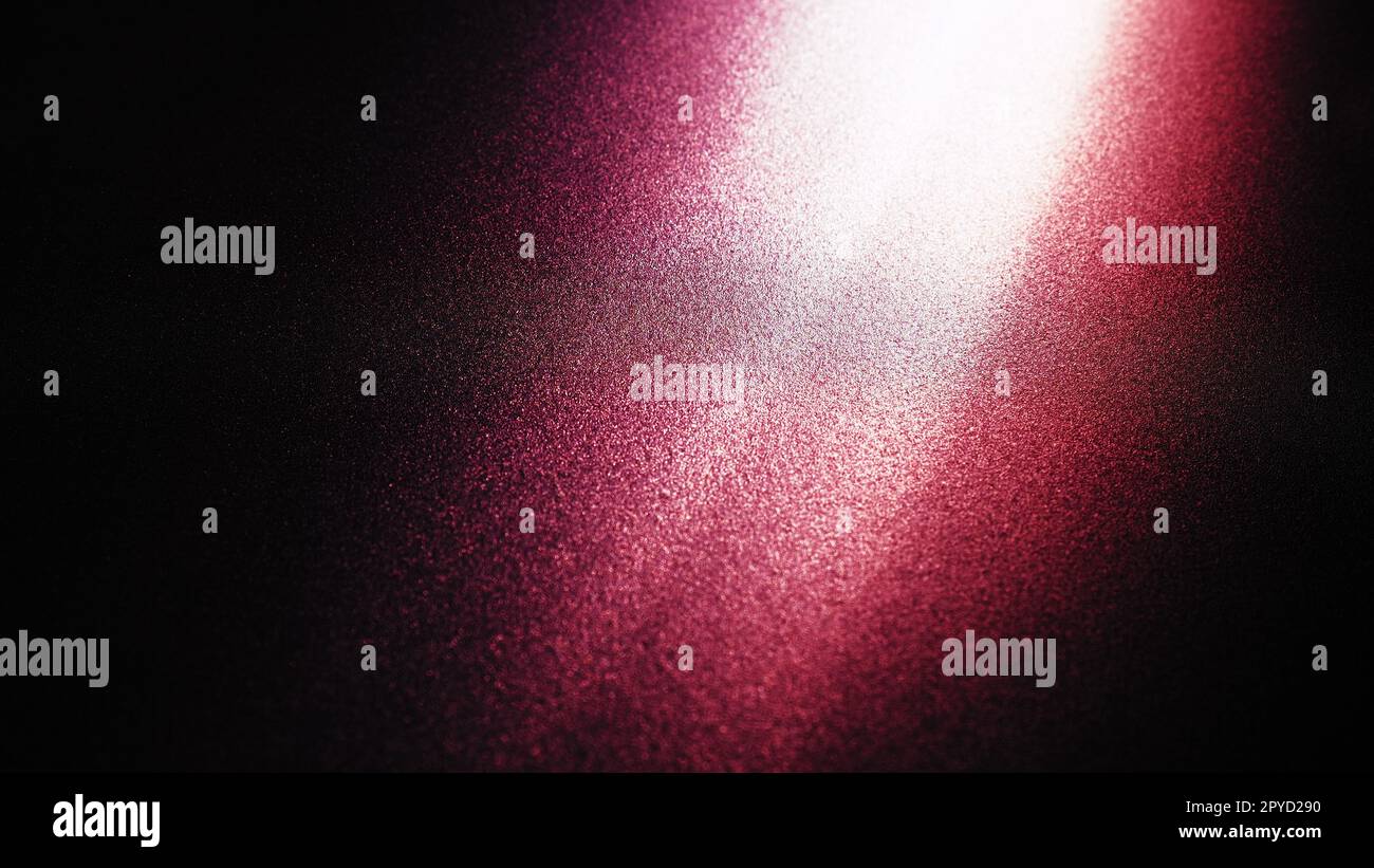 Diagonal rays of light on a red, burgundy and black background. Blurred ...