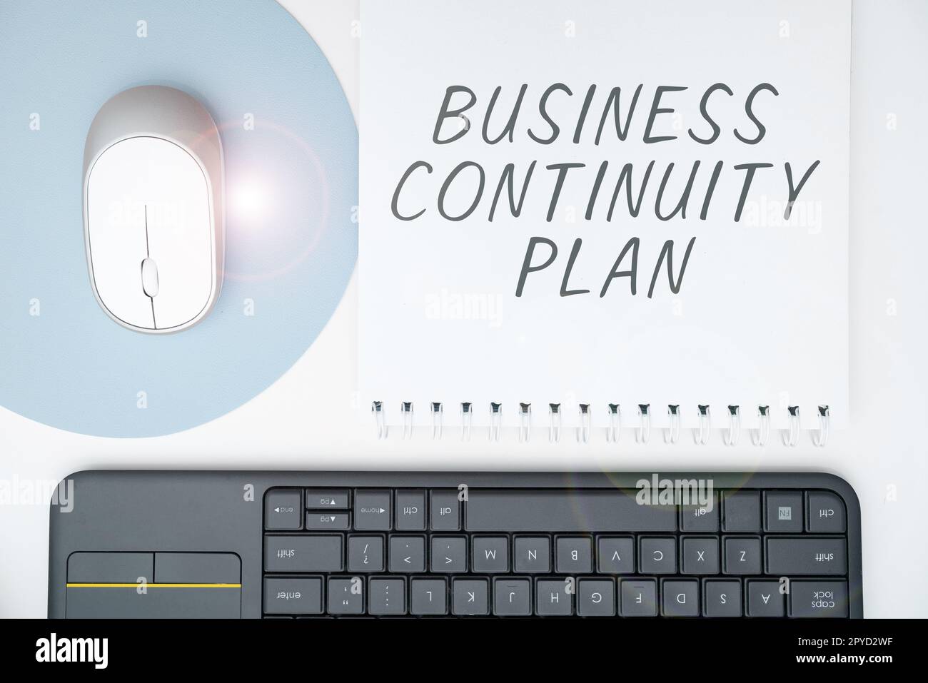 Hand writing sign Business Continuity Plan. Business overview creating ...