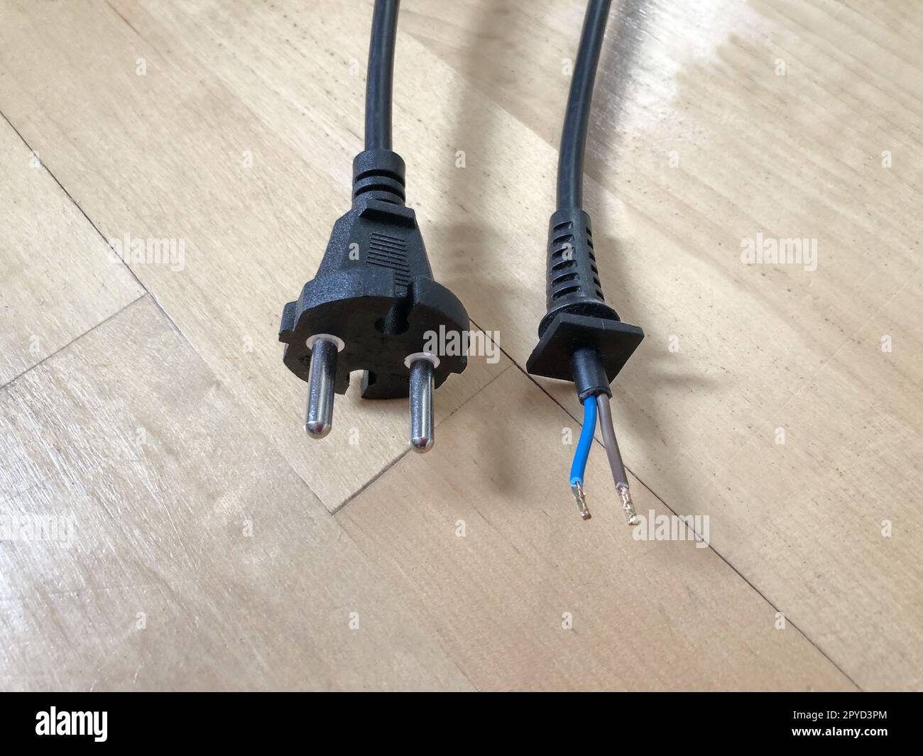 black electrical wire with electric plug Stock Photo - Alamy