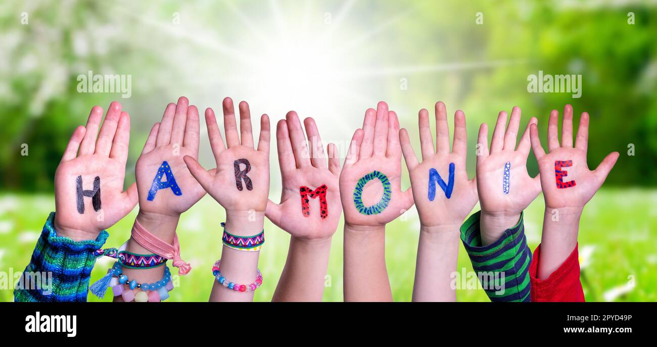 Children Hands Building Harmonie Means Harmony, Grass Meadow Stock ...