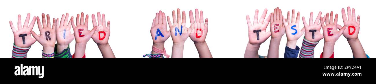 Children Hands Building Word Tried And Tested, White Background Stock ...