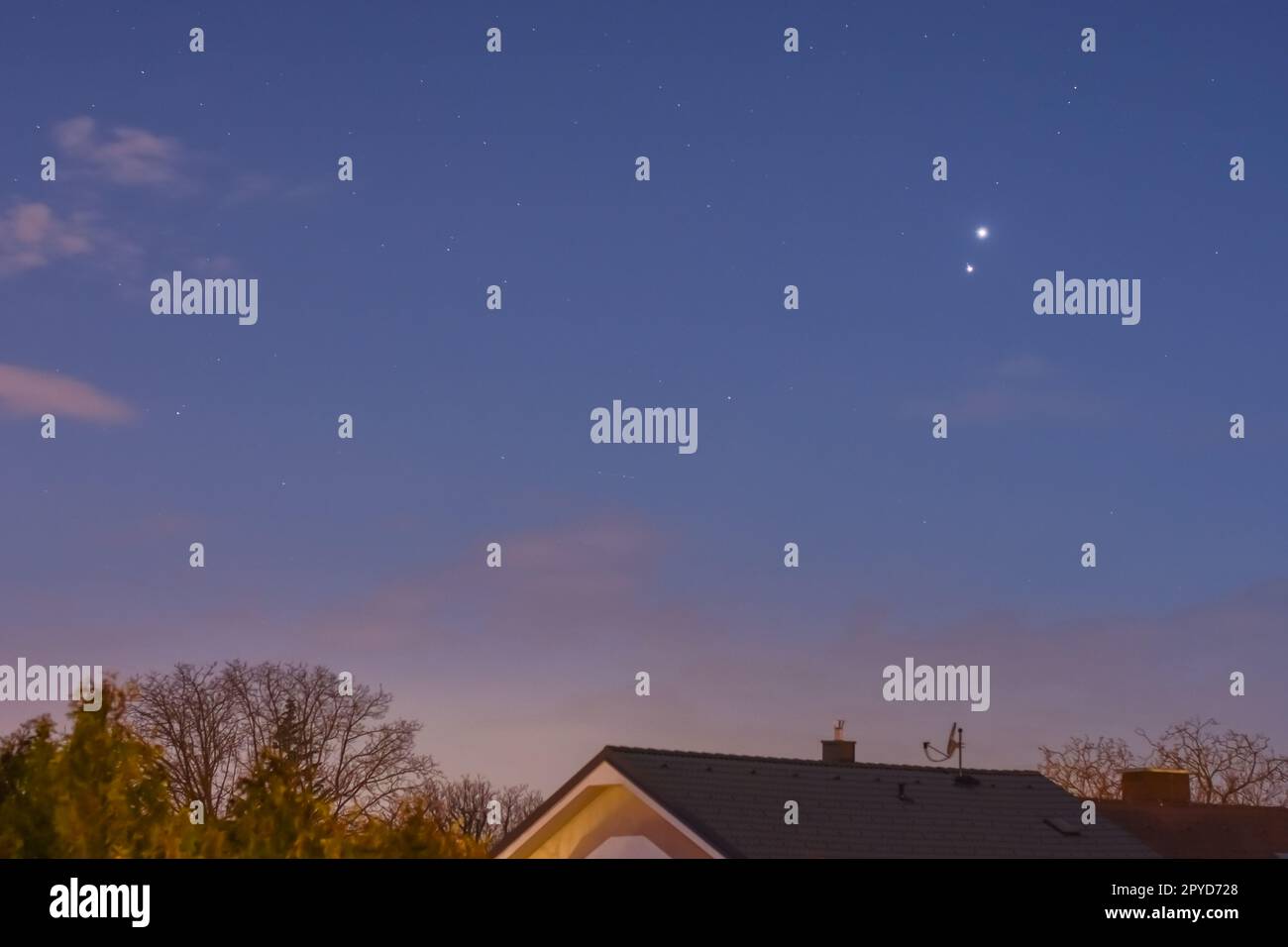 two stars jupiter and venus shining over houses at the sky Stock Photo ...