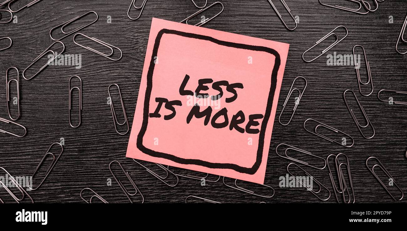 Text caption presenting Less Is More. Word Written on Minimalist ...