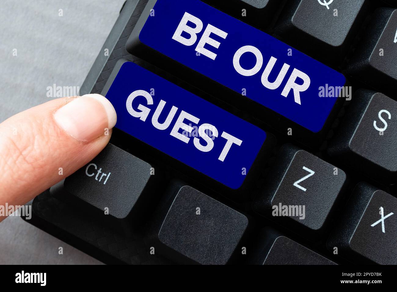 Hand writing sign Be Our Guest. Business idea You are welcome to stay ...