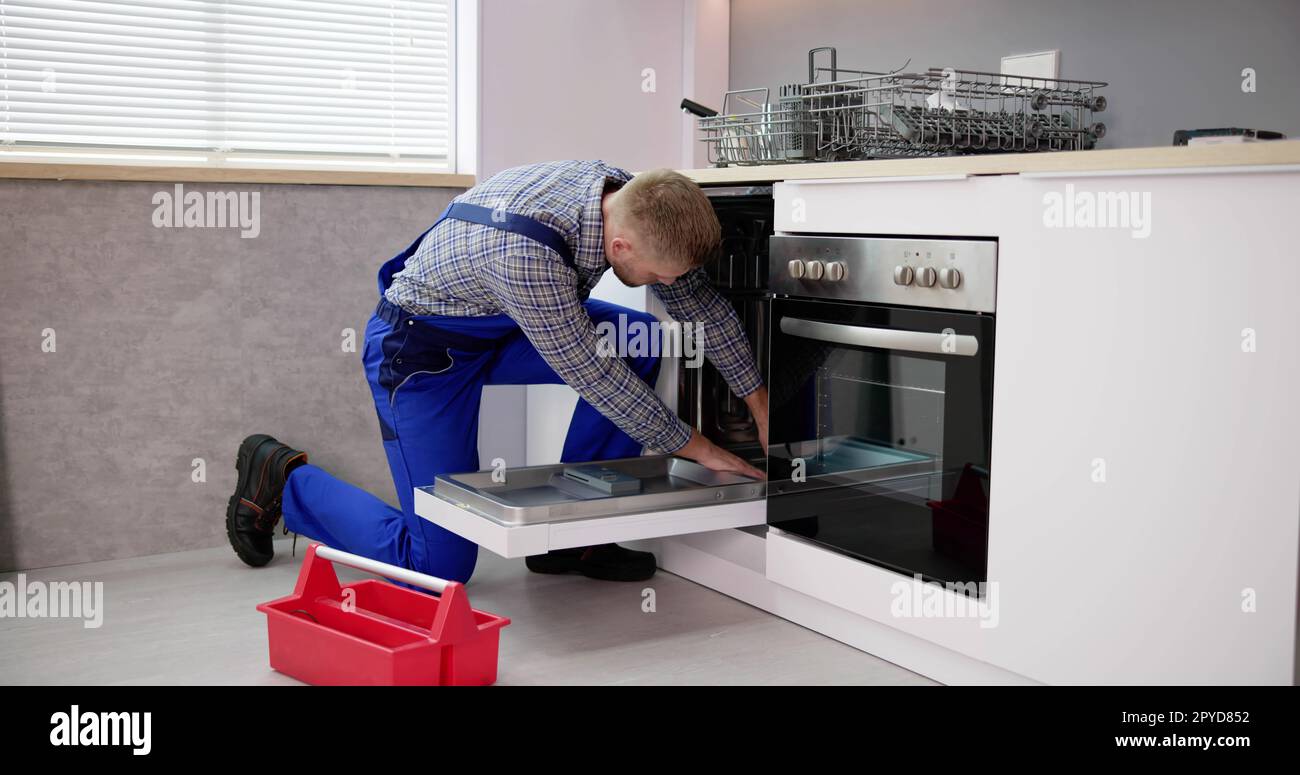 Dishwasher Appliance Repair Service Stock Photo - Alamy
