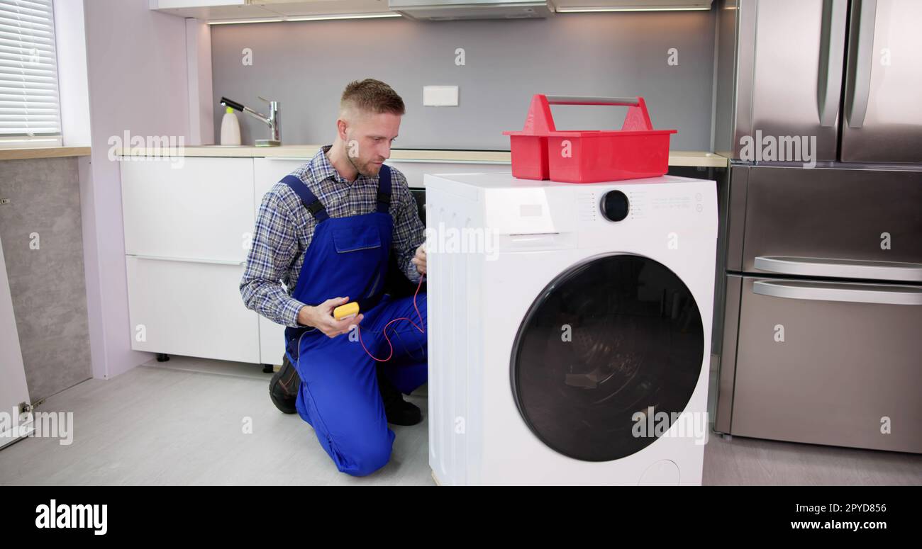 Washing machine repair hi-res stock photography and images - Alamy