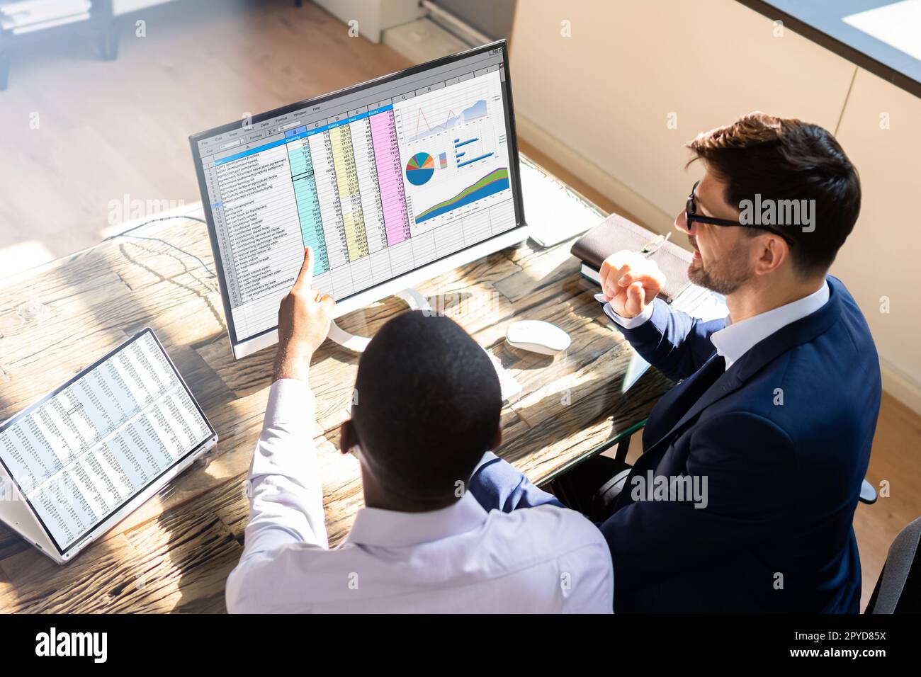 Spreadsheet Data On Computer Monitor Stock Photo - Alamy