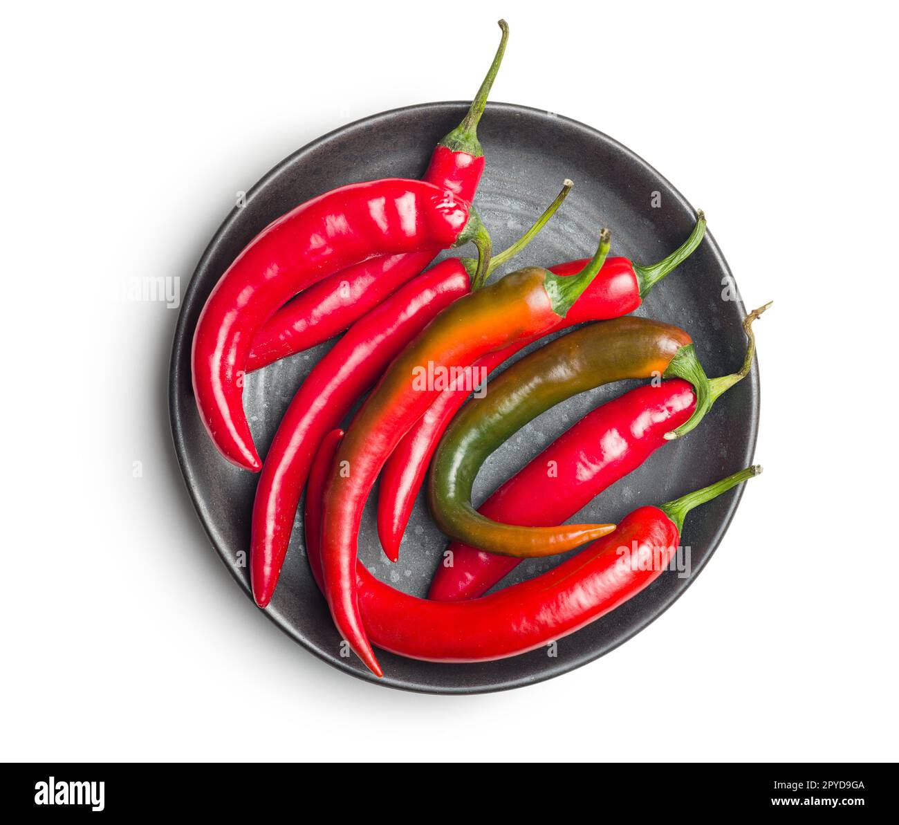 Red chili peppers. Hot spice peppers on plate isolated on white ...