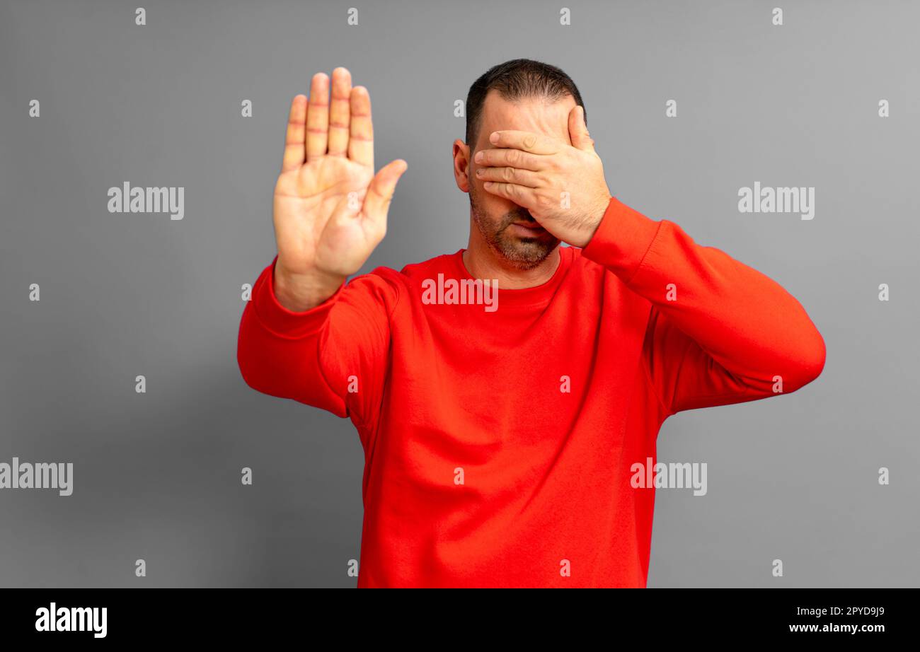 I don't want to look at this. Ignore portrait of a bearded Hispanic man ...