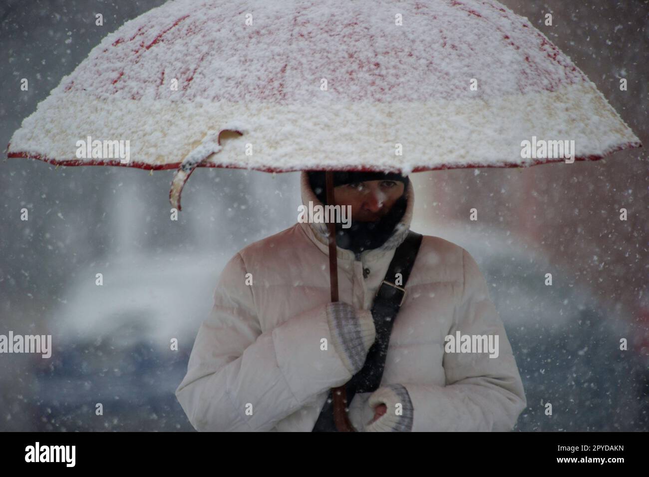 Winter's chill is palpable as a person walks through a blizzard ...