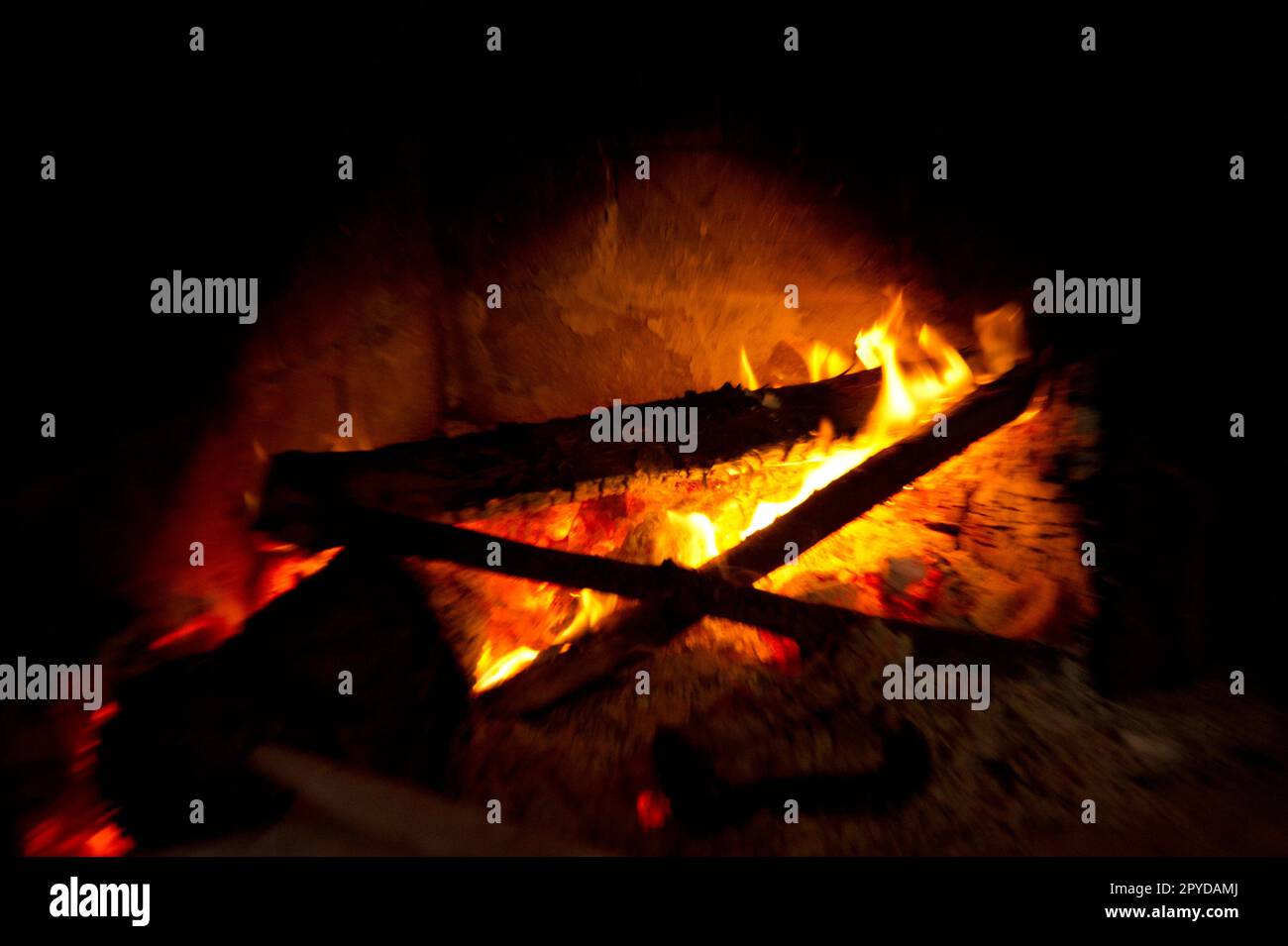 A Fire Burns In A Fireplace Fire To Keep Warm Stock Photo - Alamy