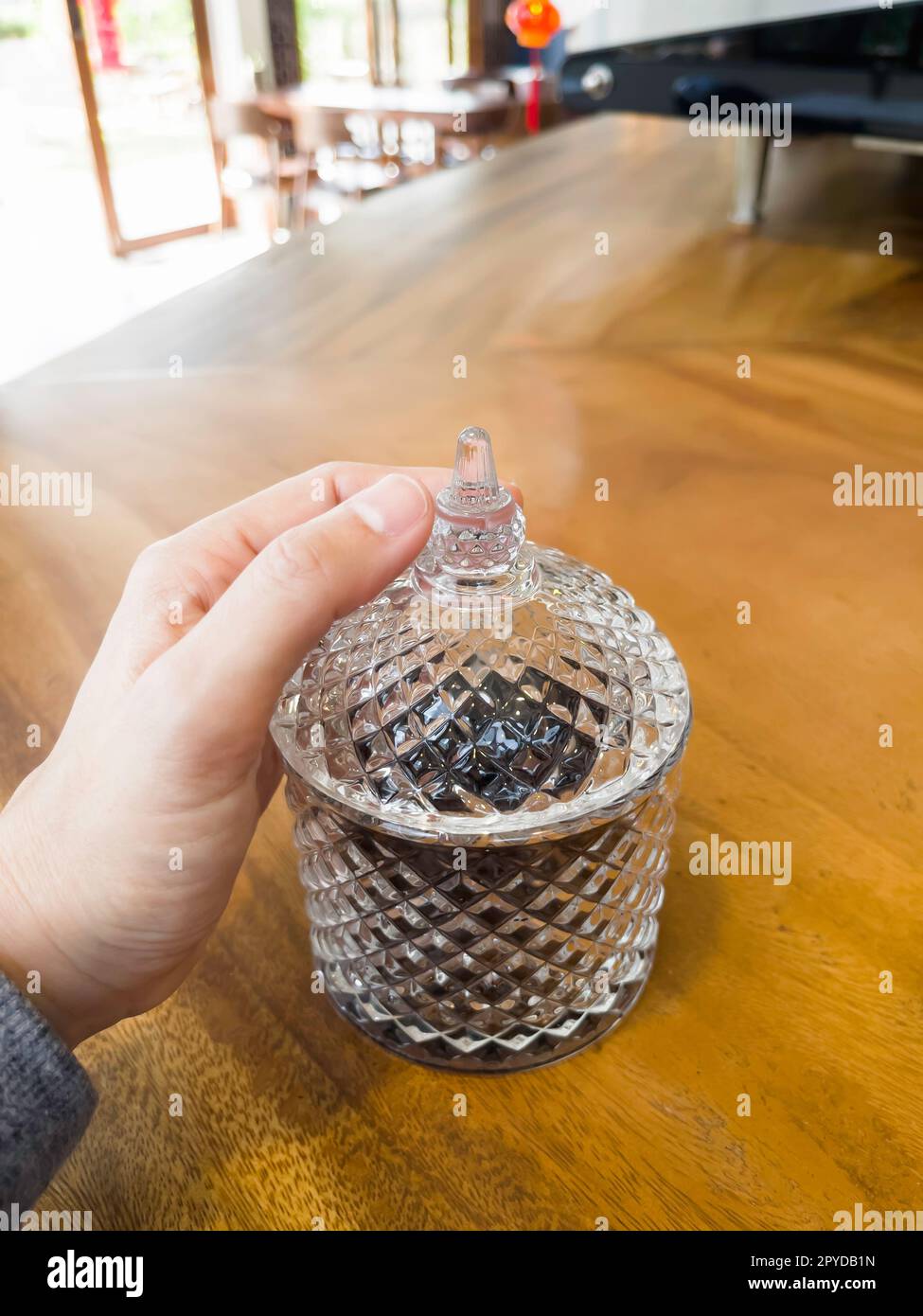 hands open a jar of roasted coffee bean Stock Photo - Alamy