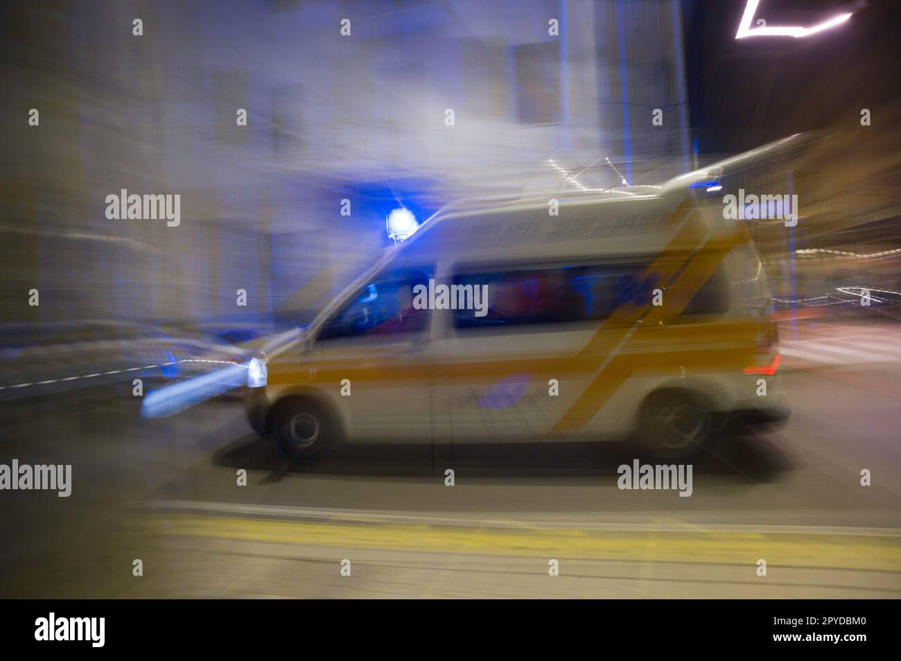 Paramedic ambulance in blurred motion ambulance races to respond to the ...