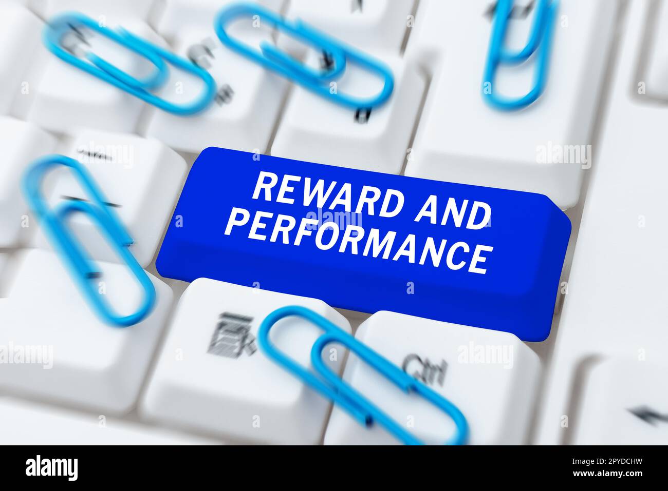 Hand writing sign Reward And Performance. Word Written on Given in ...