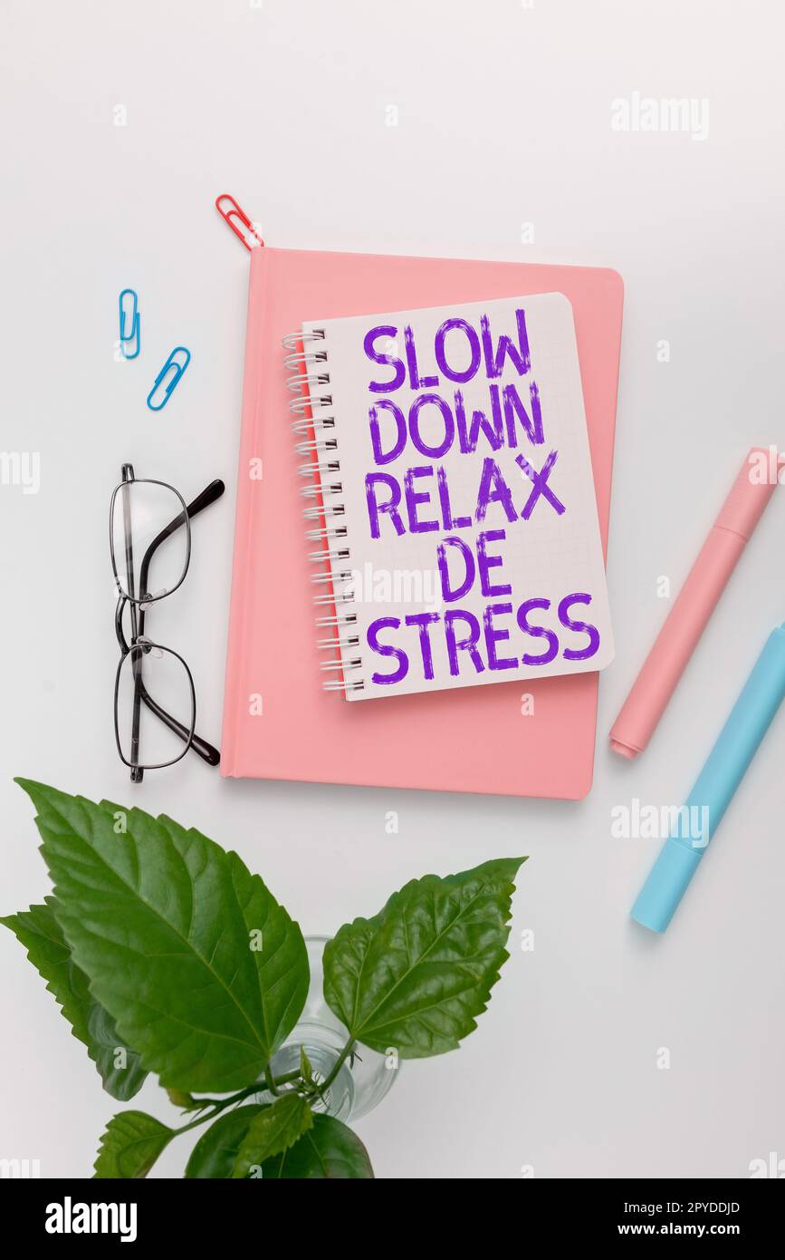 Hand writing sign Slow Down Relax De Stress. Business approach Have a ...