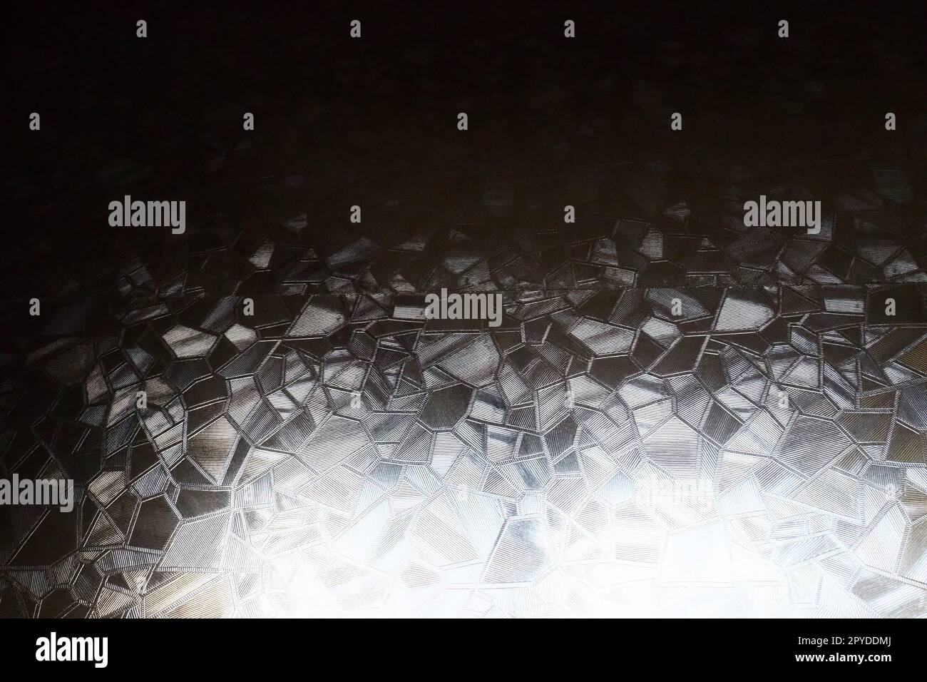 Fluted glass with backlight. Beautiful multicolored refraction of light ...