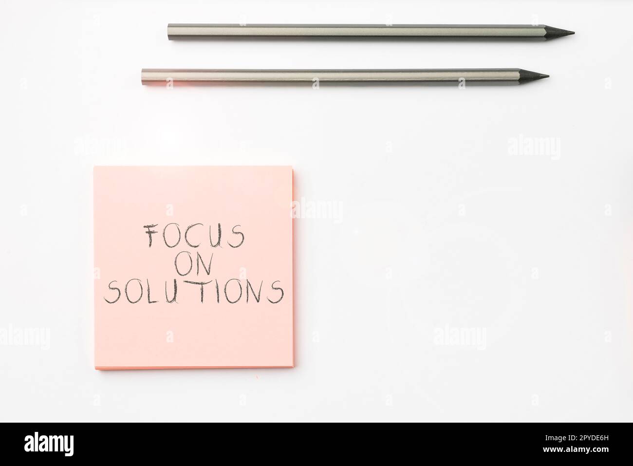 Hand writing sign Focus On Solutions. Business showcase powerful ...