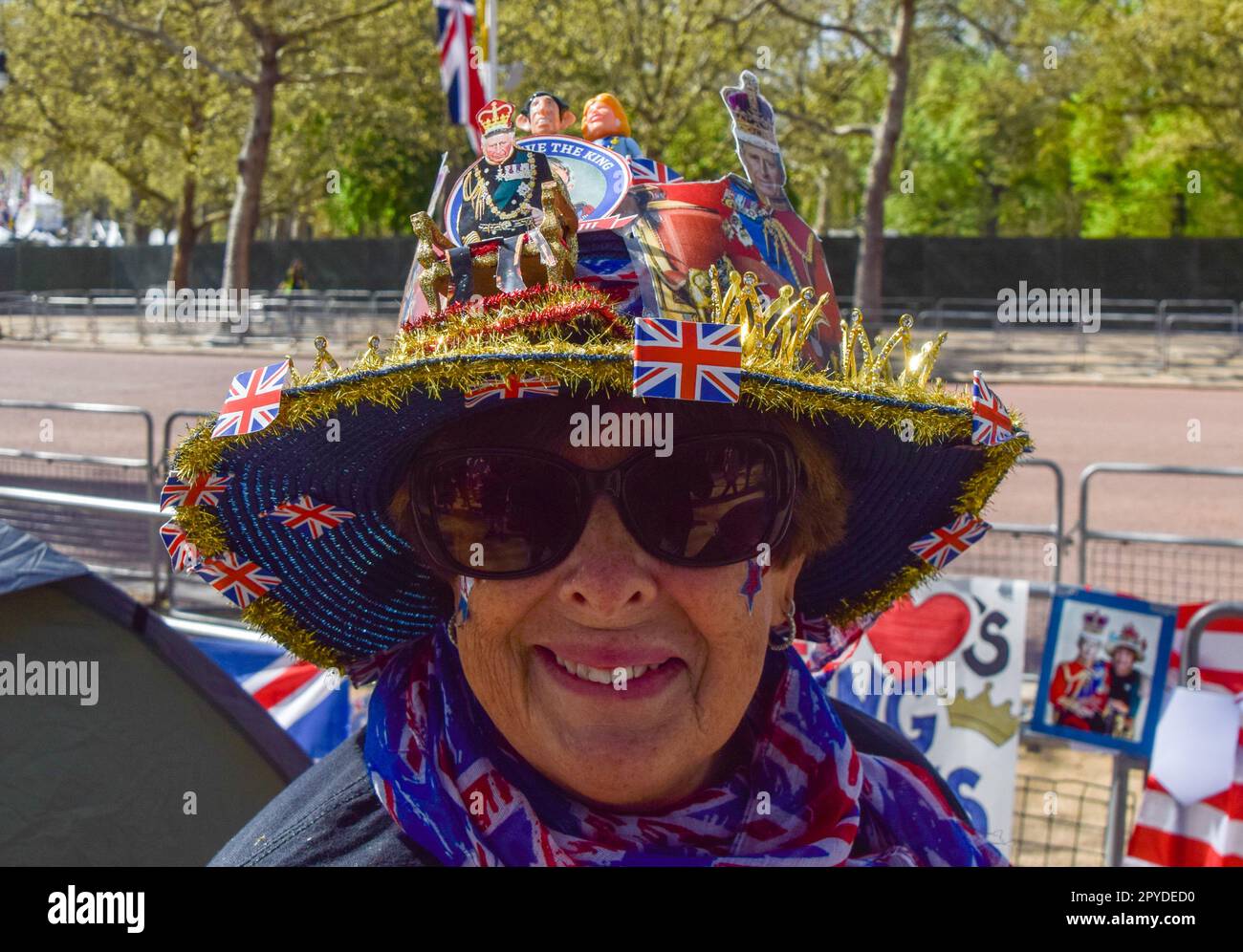 London, England, UK. 3rd May, 2023. A royal superfan wears an elaborate ...