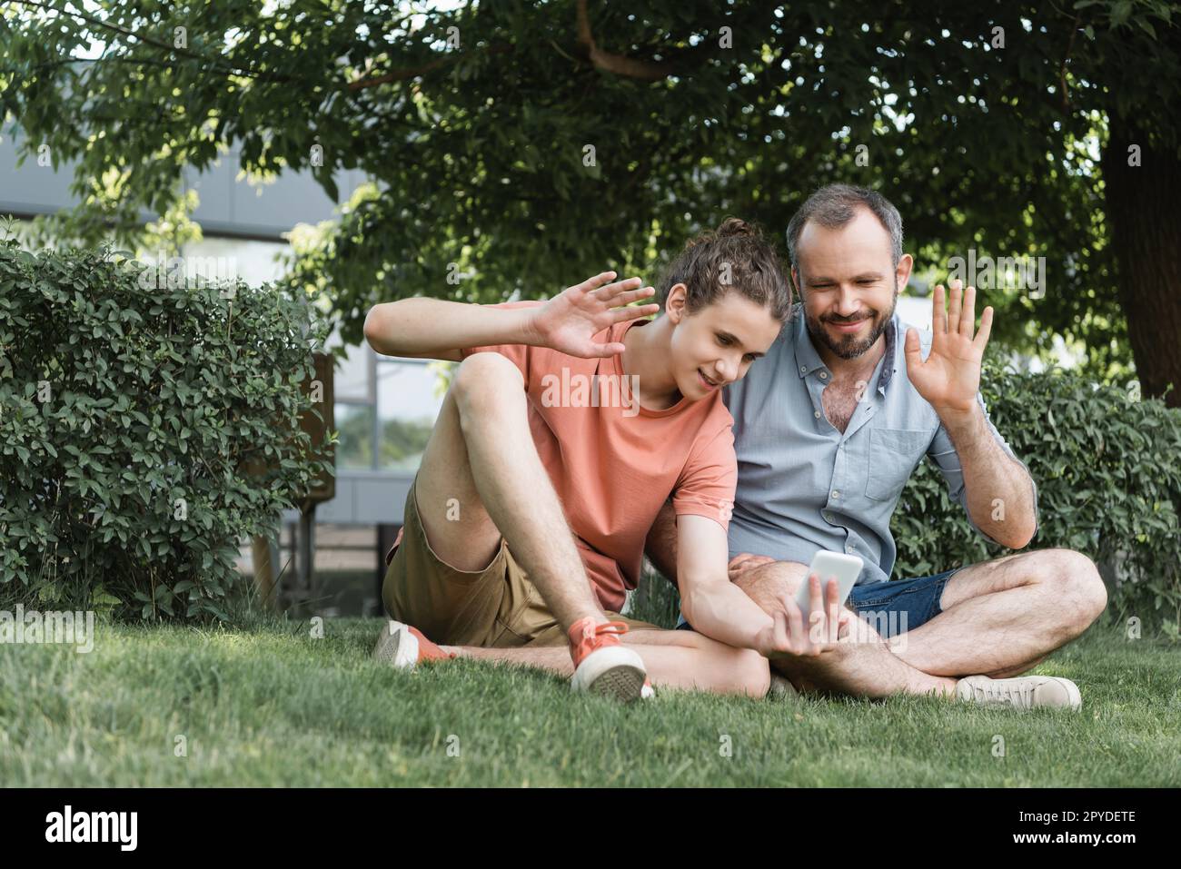 Boy teen video call waving hi-res stock photography and images - Alamy
