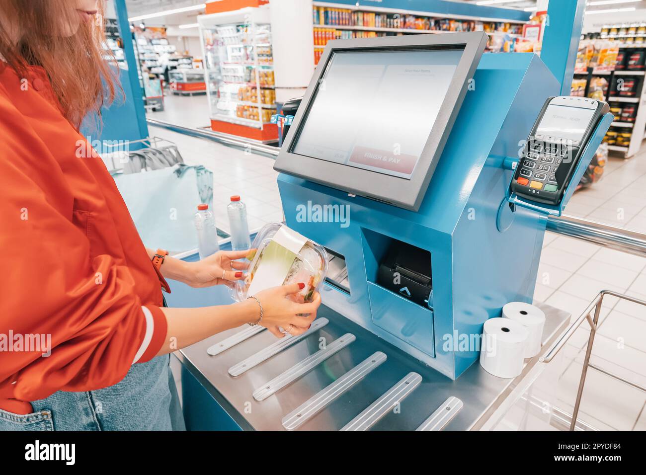 automated self-service checkout at the supermarket allows customers to ... automated self-service checkout at the supermarket allows customers to ...
