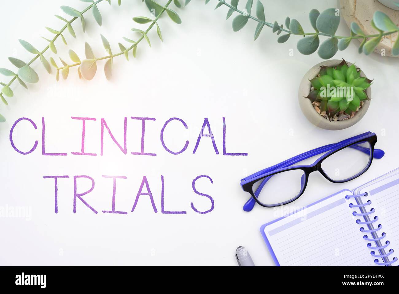 Hand writing sign Clinical Trials. Business concept Research ...