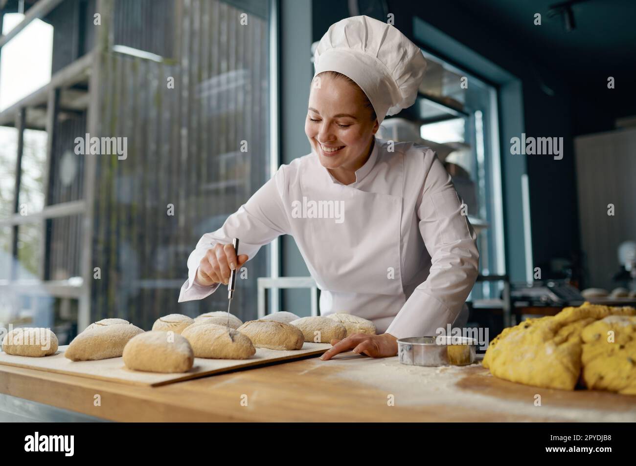 Making traditional yeast buns cheese hi-res stock photography and ...