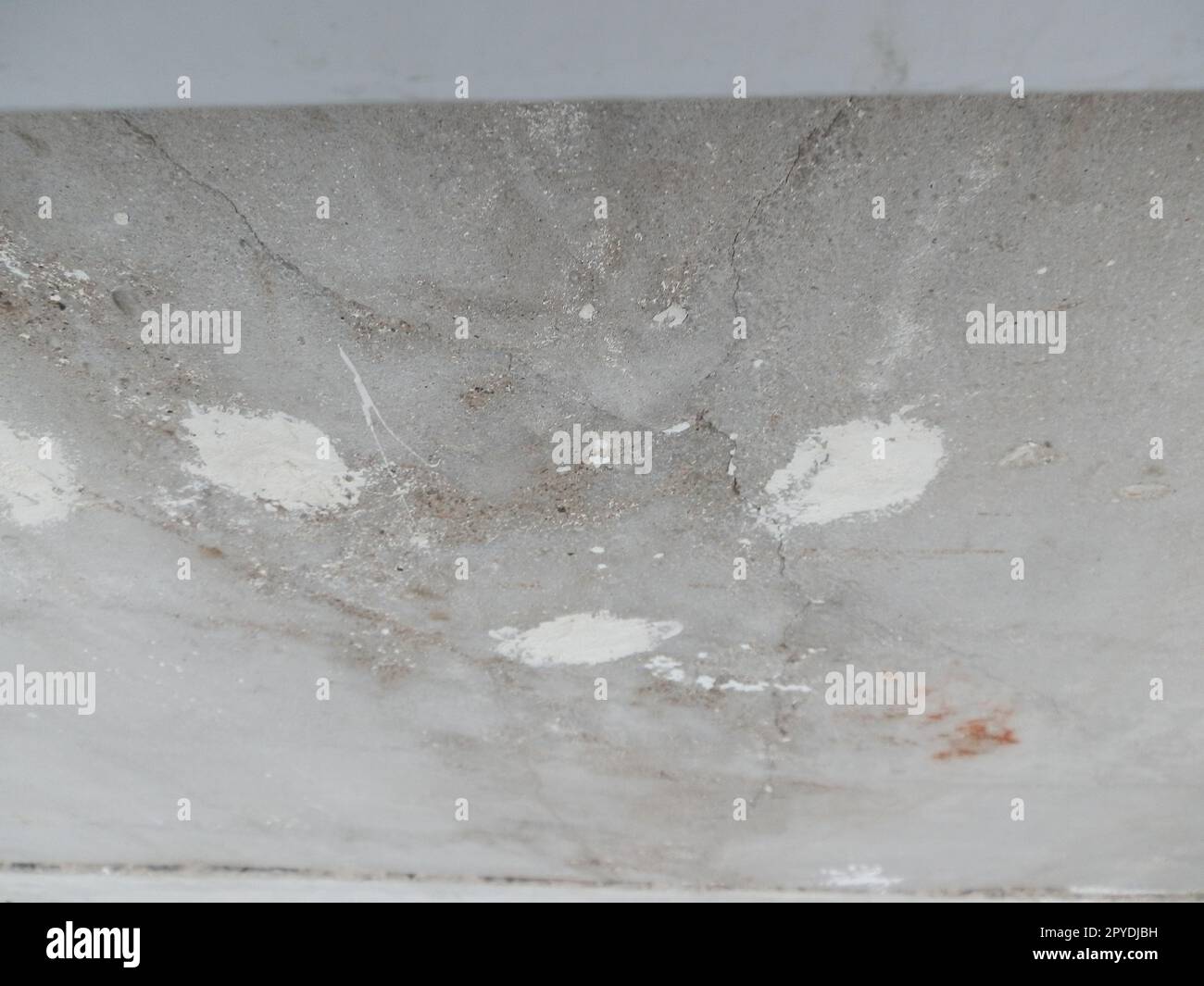 Old cracked balcony railing slab in need of repair Stock Photo - Alamy