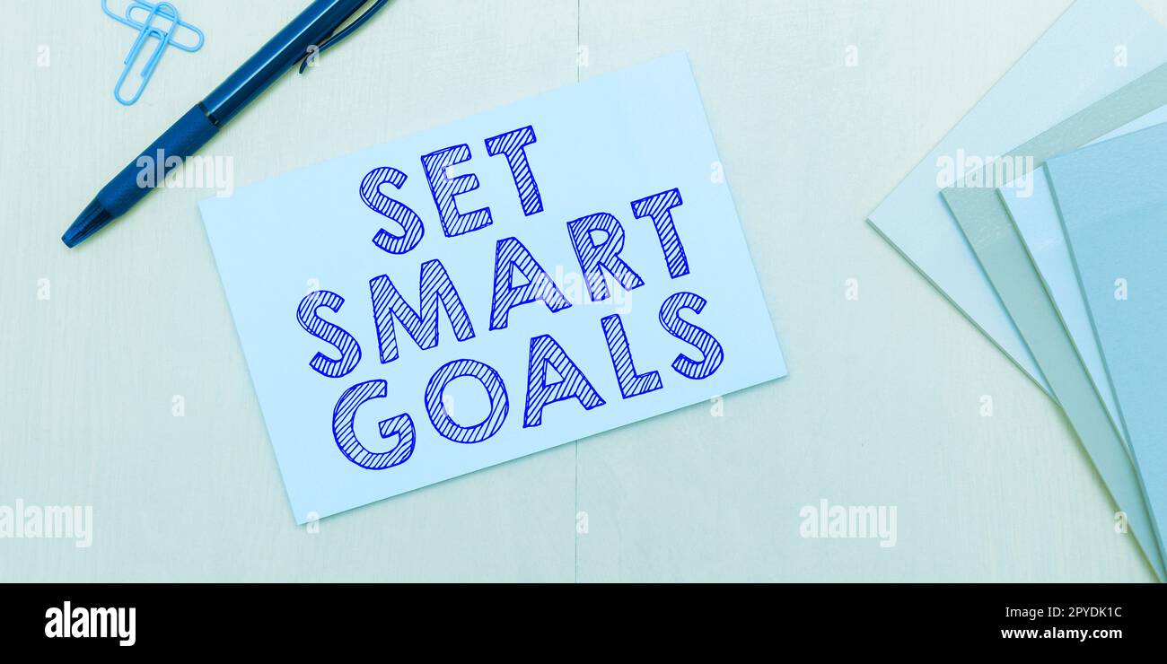 Handwriting text Set Smart Goals. Internet Concept Establish achievable ...