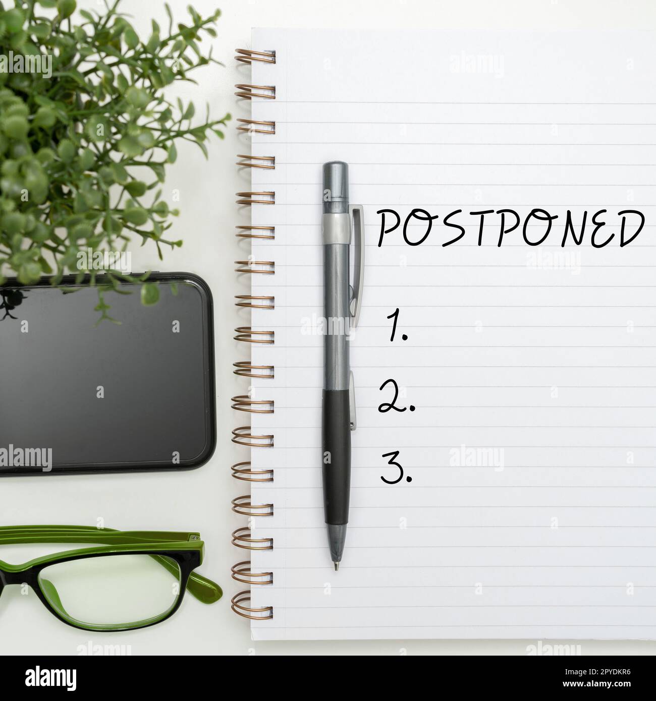 Sign displaying Postponed. Word for to place later in order of ...
