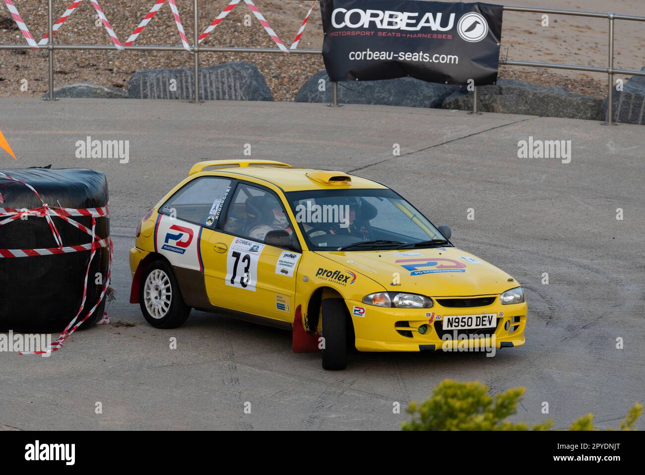 Chris Woodcock racing a 1996 Proton Compact competing in the Corbeau ...