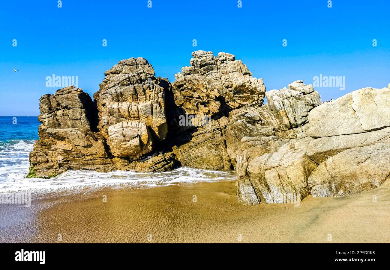 Big surfer waves and rocks at beach Puerto Escondido Mexico Stock Photo ...