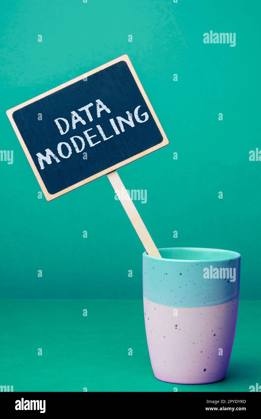 Writing displaying text Data Modeling. Business concept process of transferring data between ...