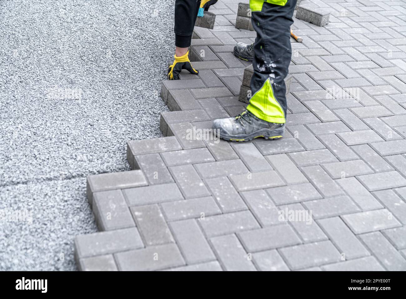 construction of a sidewalk from concrete blocks Stock Photo - Alamy