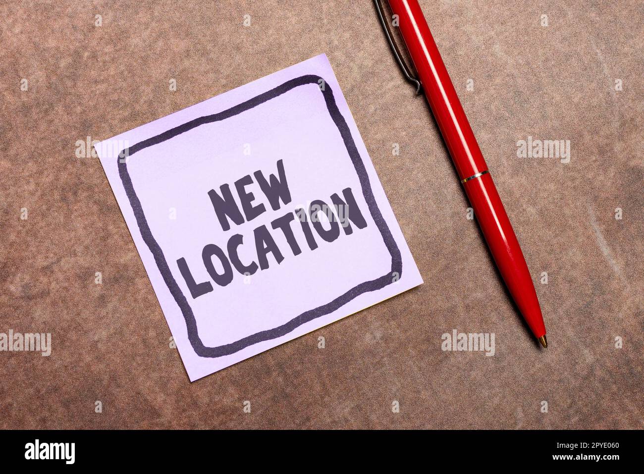 Hand writing sign New Location. Internet Concept Get located on a new ...