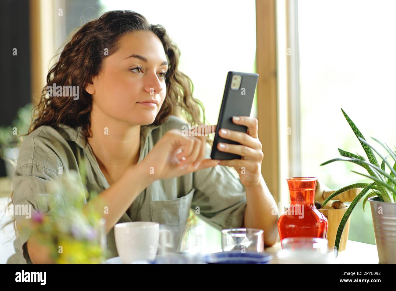 Person checking smart phone hi-res stock photography and images - Alamy