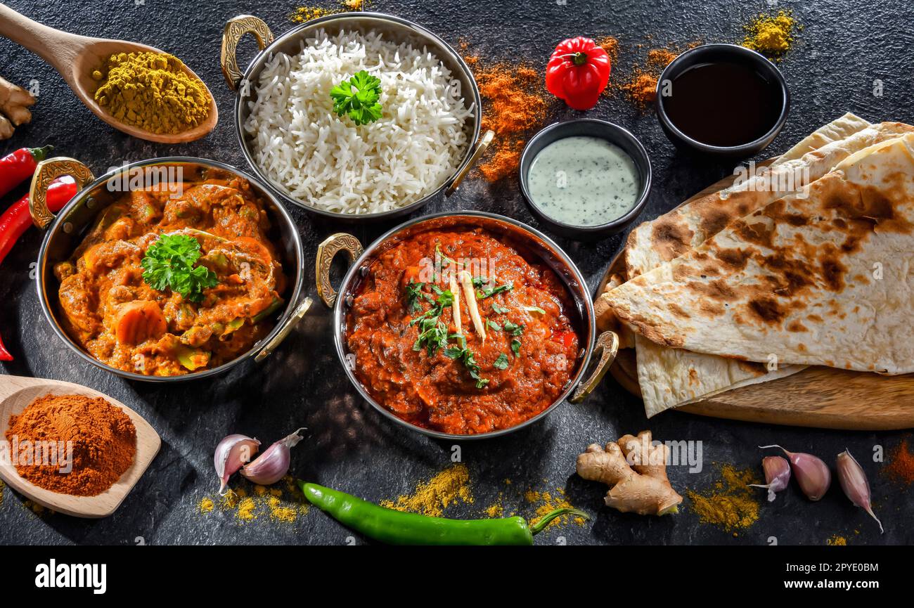Hot madras paneer and vegetable masala with rice Stock Photo - Alamy