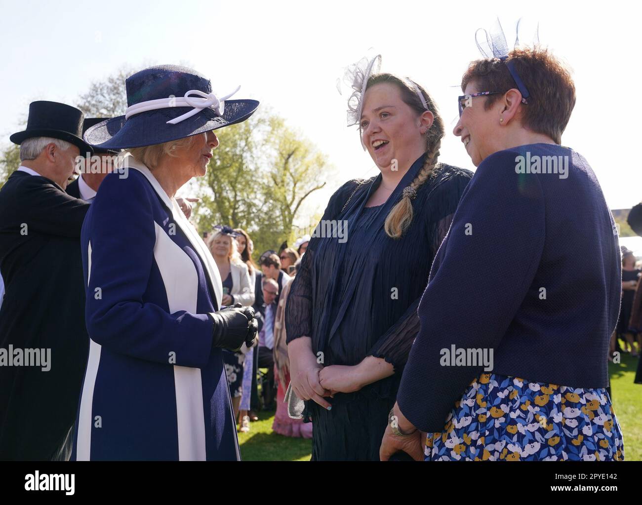 The Queen Consort meeting Niamh (centre) and Helen King, during a ...