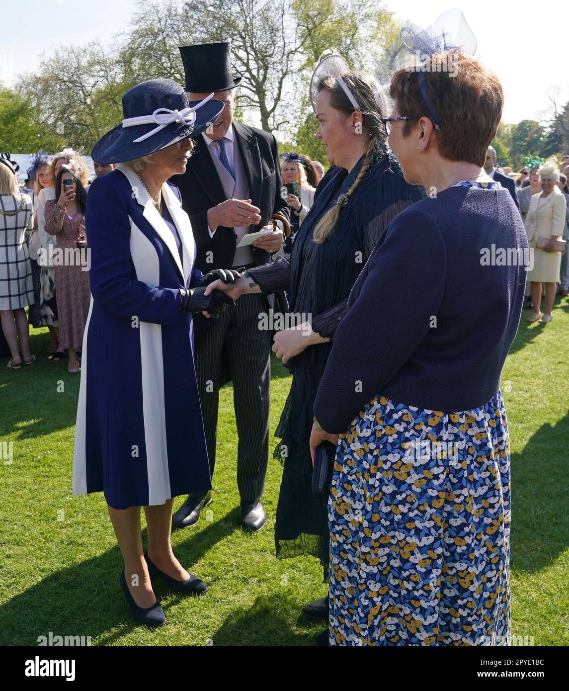 The Queen Consort meeting Niamh (centre) and Helen King, during a ...