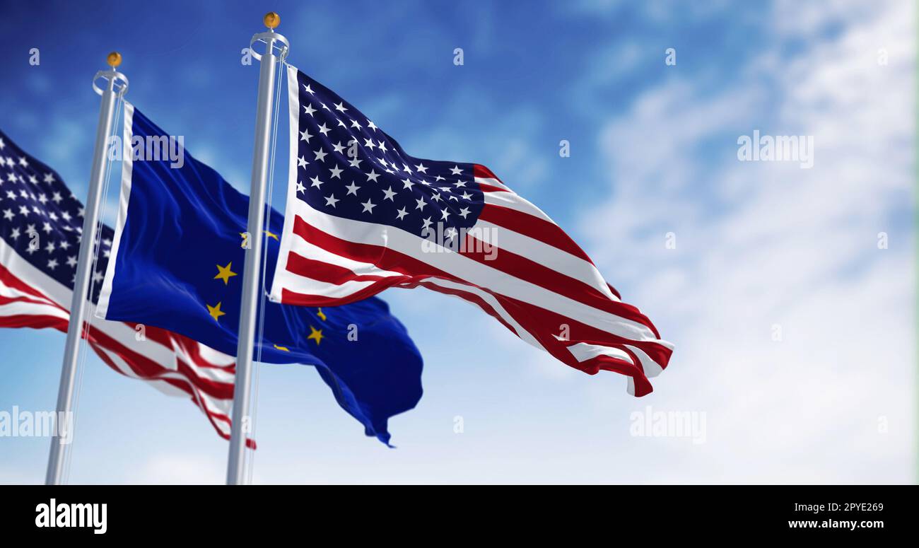 The flags of the United States of America and the European Union waving ...