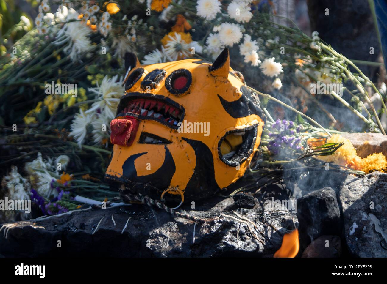 Tecuan mask that is being blessed on an altar. Inhabitants of the Nahua ...