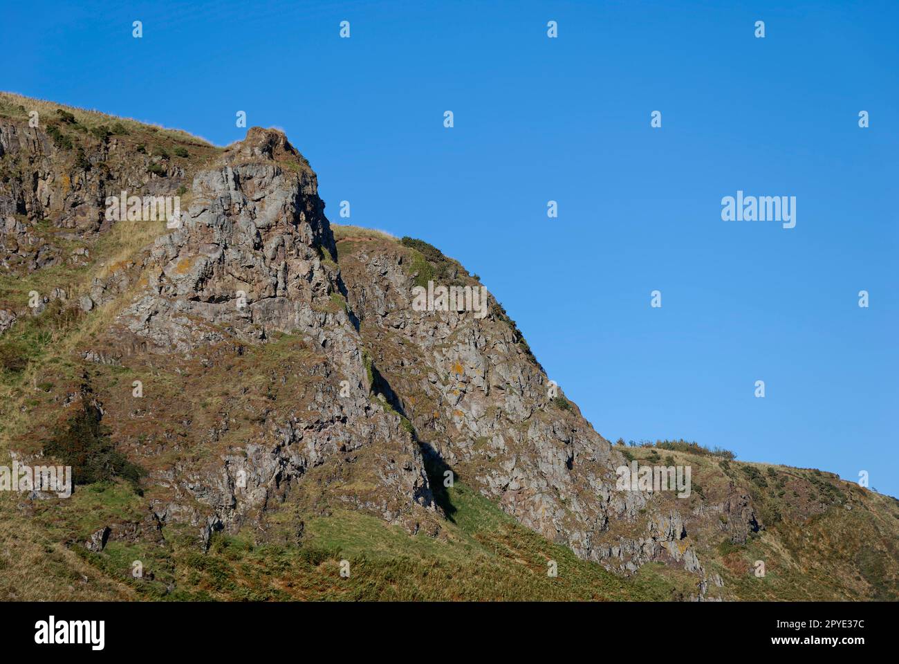 The dramatic Volcanic Sea Cliffs behind the Beach of St Cyrus on the ...