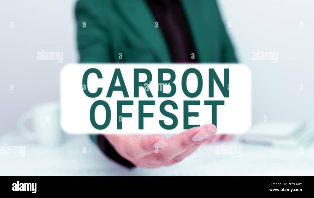 Sign displaying Carbon Offset. Business concept Reduction in emissions ...
