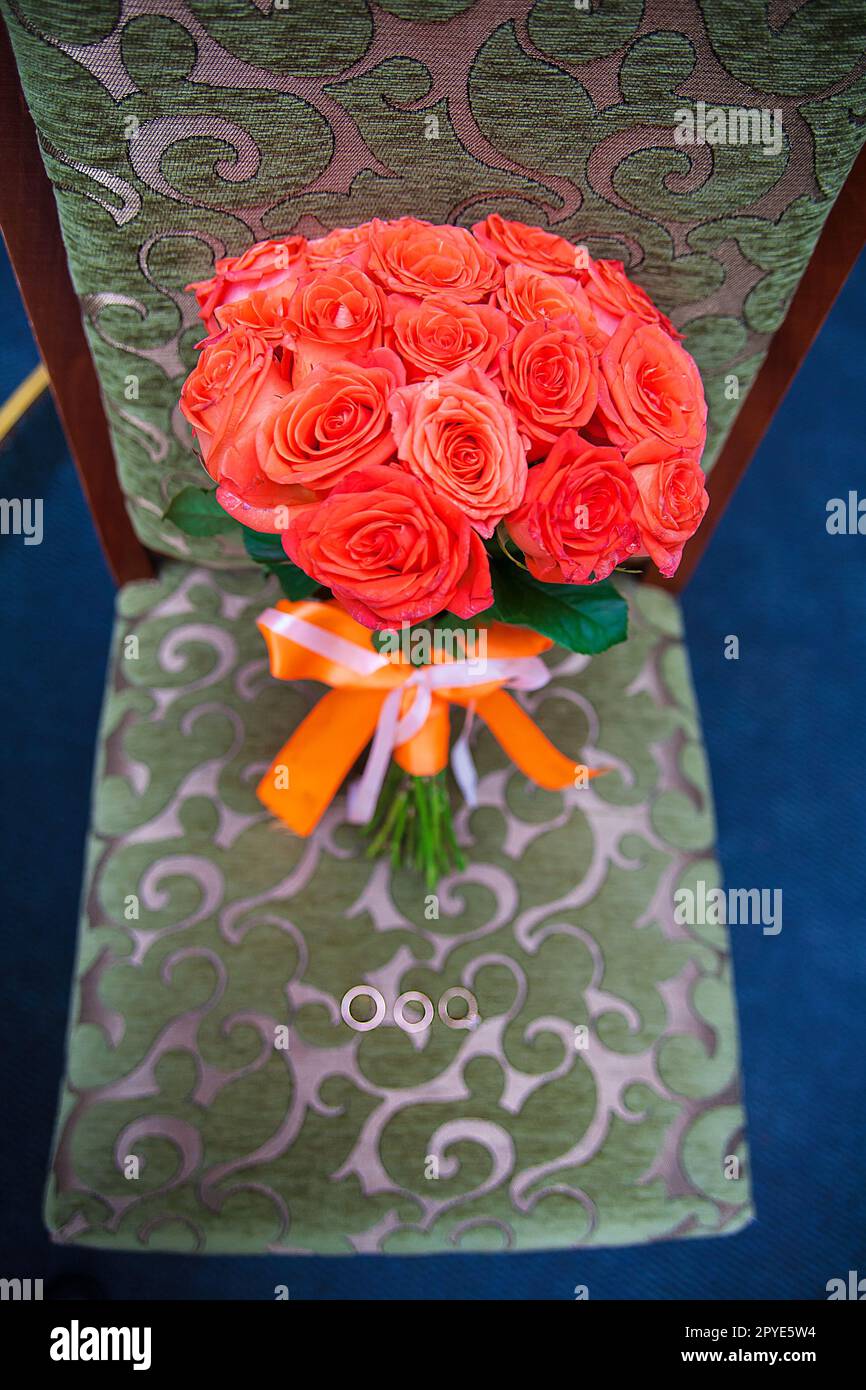 Flowers on chair hi-res stock photography and images - Alamy